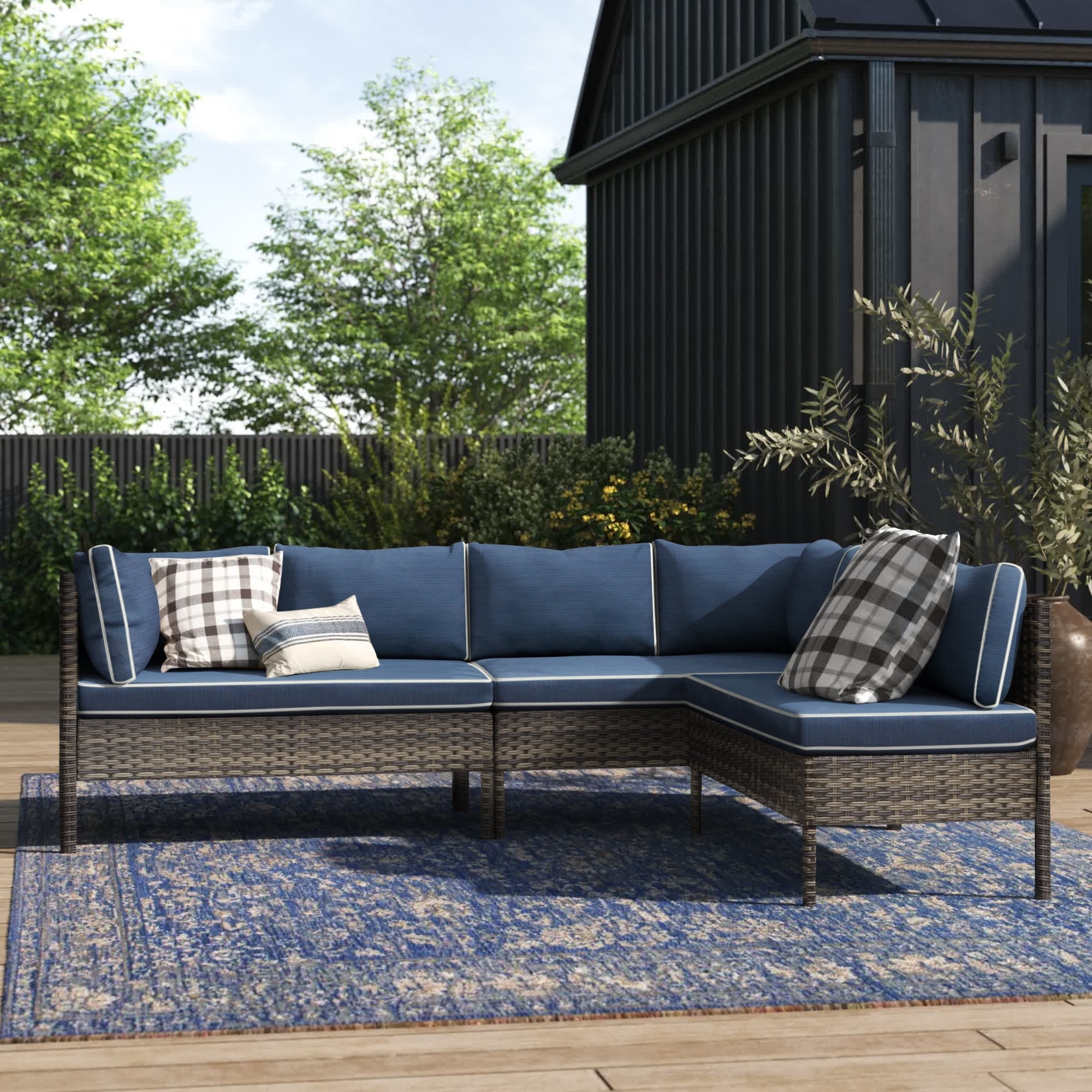 3 piece rattan sectional seating group with cushions store